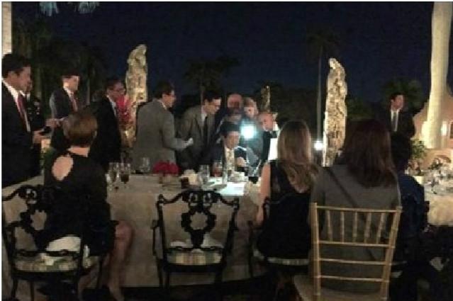 Mar-a-Lago Guest Posts Photos of Trump and Prime Minister Abe Reviewing ...