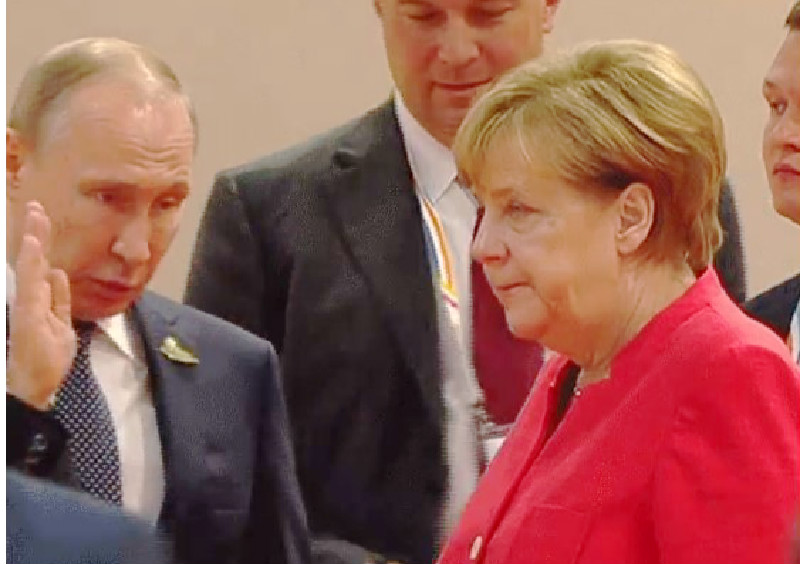 Watch Angela Merkel’s Epic Eyeroll While Vladimir Putin Prattles On