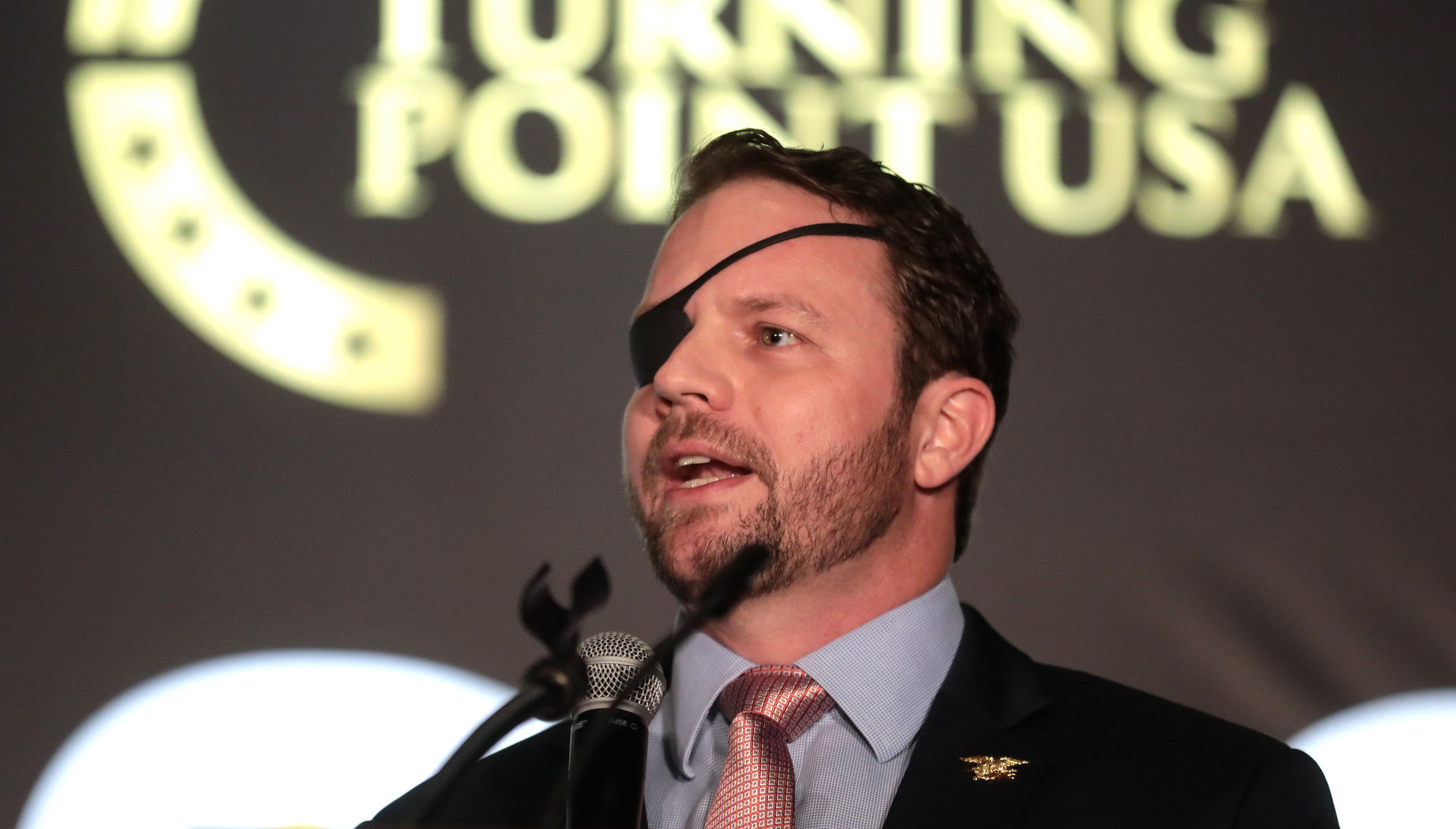 Dan Crenshaw Gets Heckled for Sparring With Young Woman
