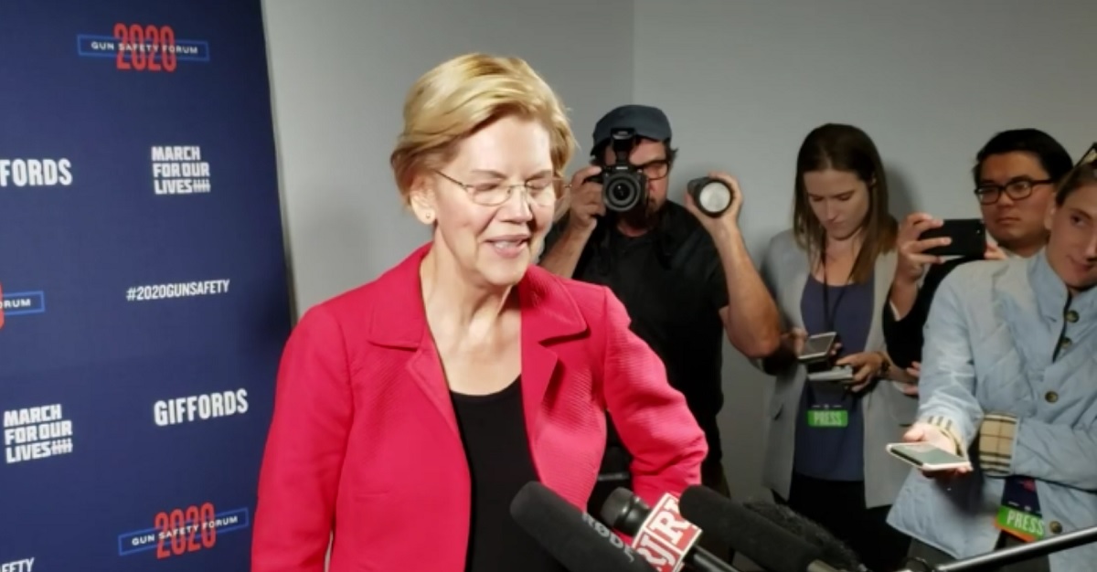 Elizabeth Warren Laughs When Asked if Trump Should Be Banned From ...