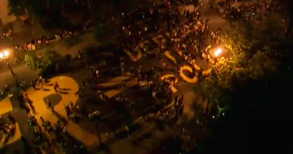 Protesters Paint 'Defund the Police' on D.C. Streets