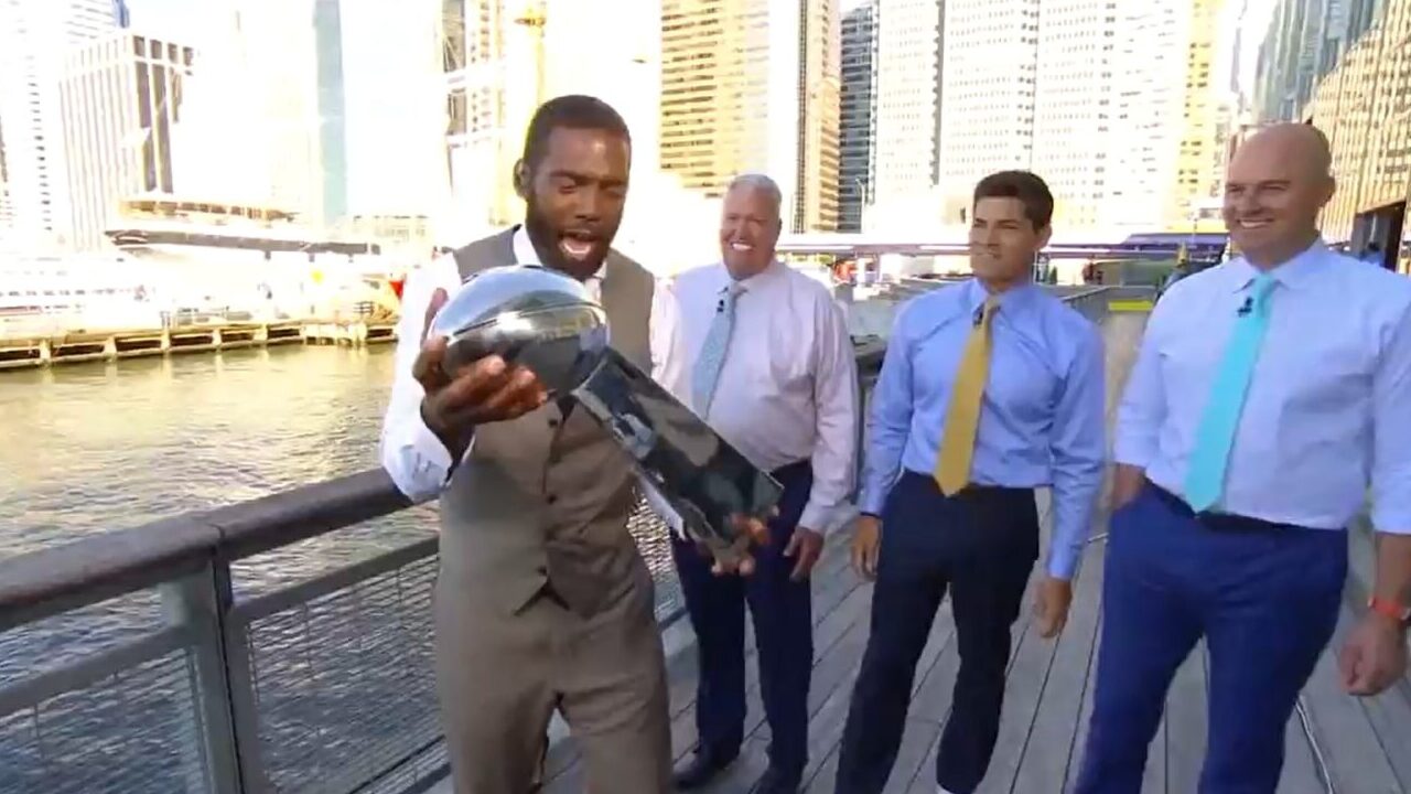 Randy Moss Tests Tom Brady's Lombardi Trophy Boat Toss