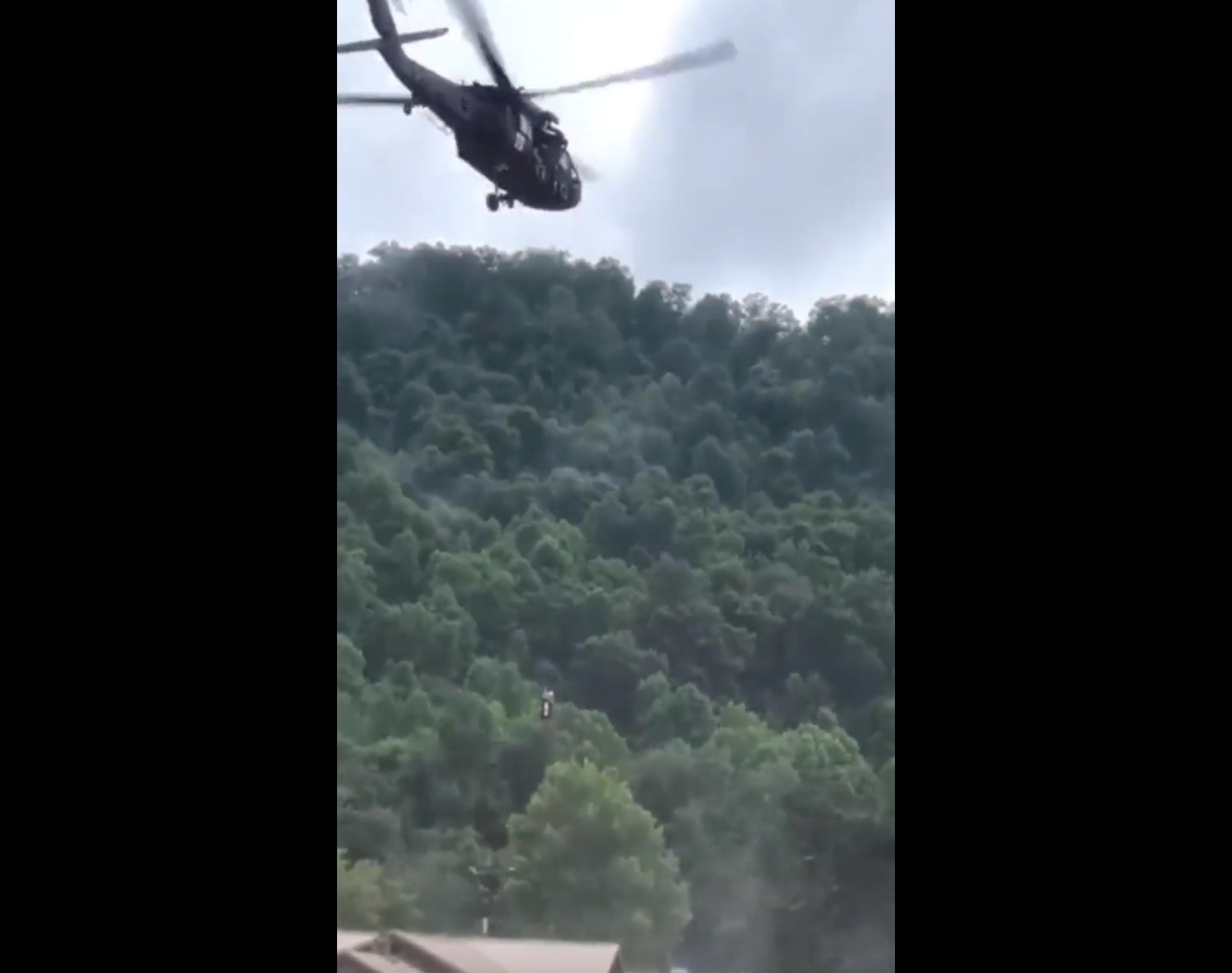 WATCH: 83-Year-Old Woman Airlifted Out of Flooded House