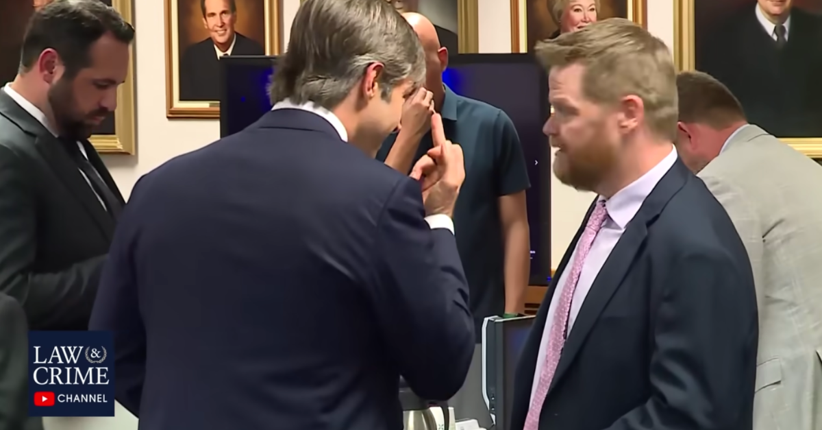 WATCH: Alex Jones' Attorney Flips Off Lawyer For Sandy Hook