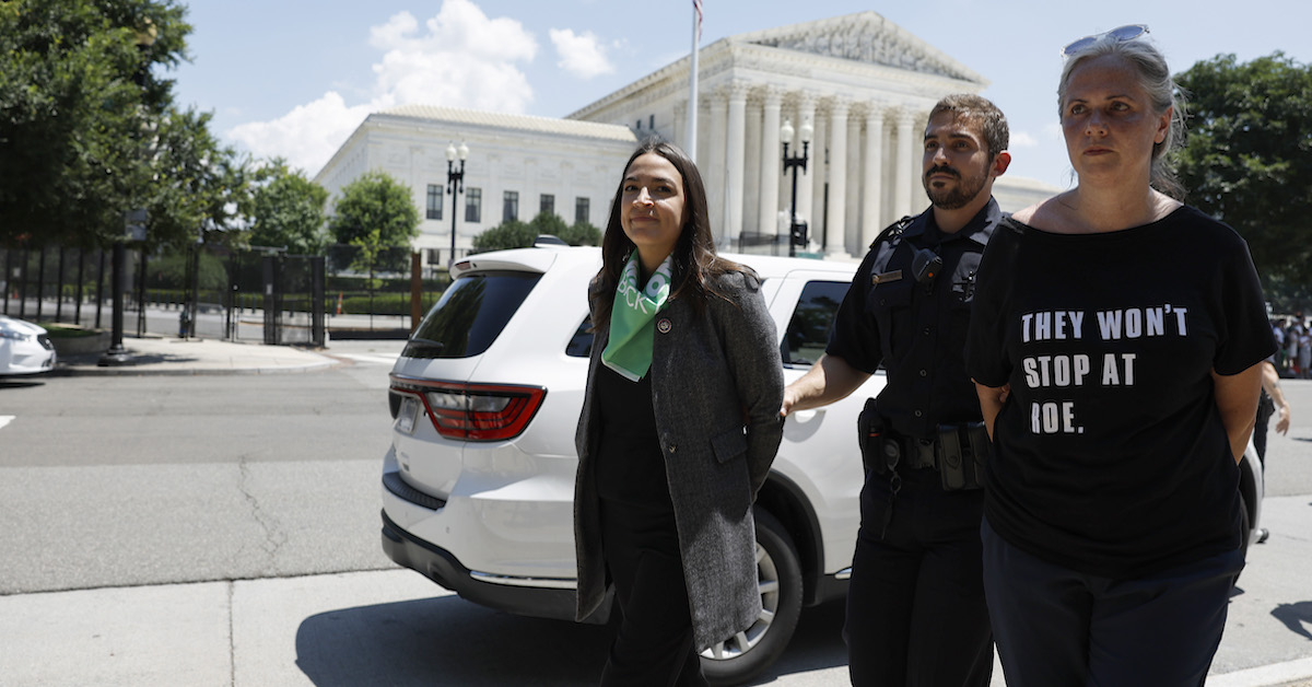 WATCH: AOC Escorted Away from Supreme Court By Police