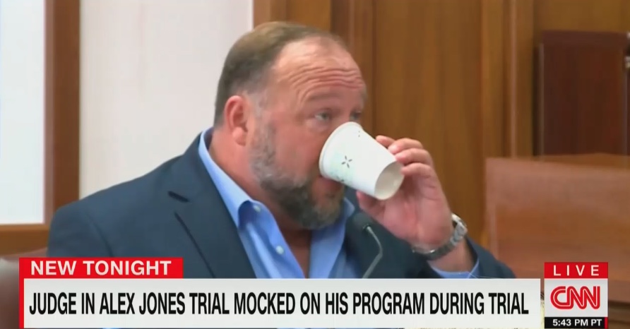 Alex Jones Takes 'Sip' from Empty Cup on the Witness Stand