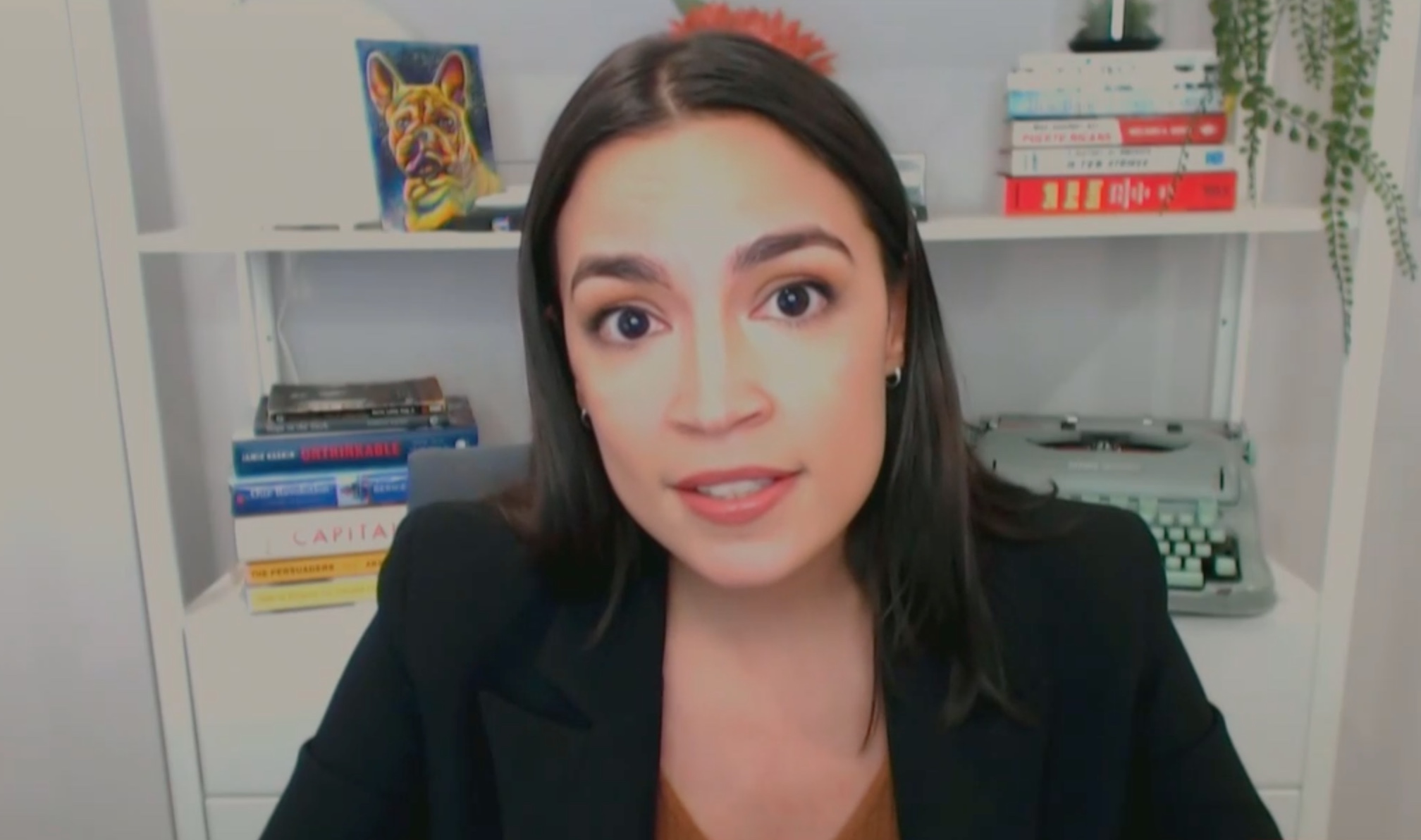 Ocasio-Cortez Dances Amid Chants of ‘AOC Has Got to Go’