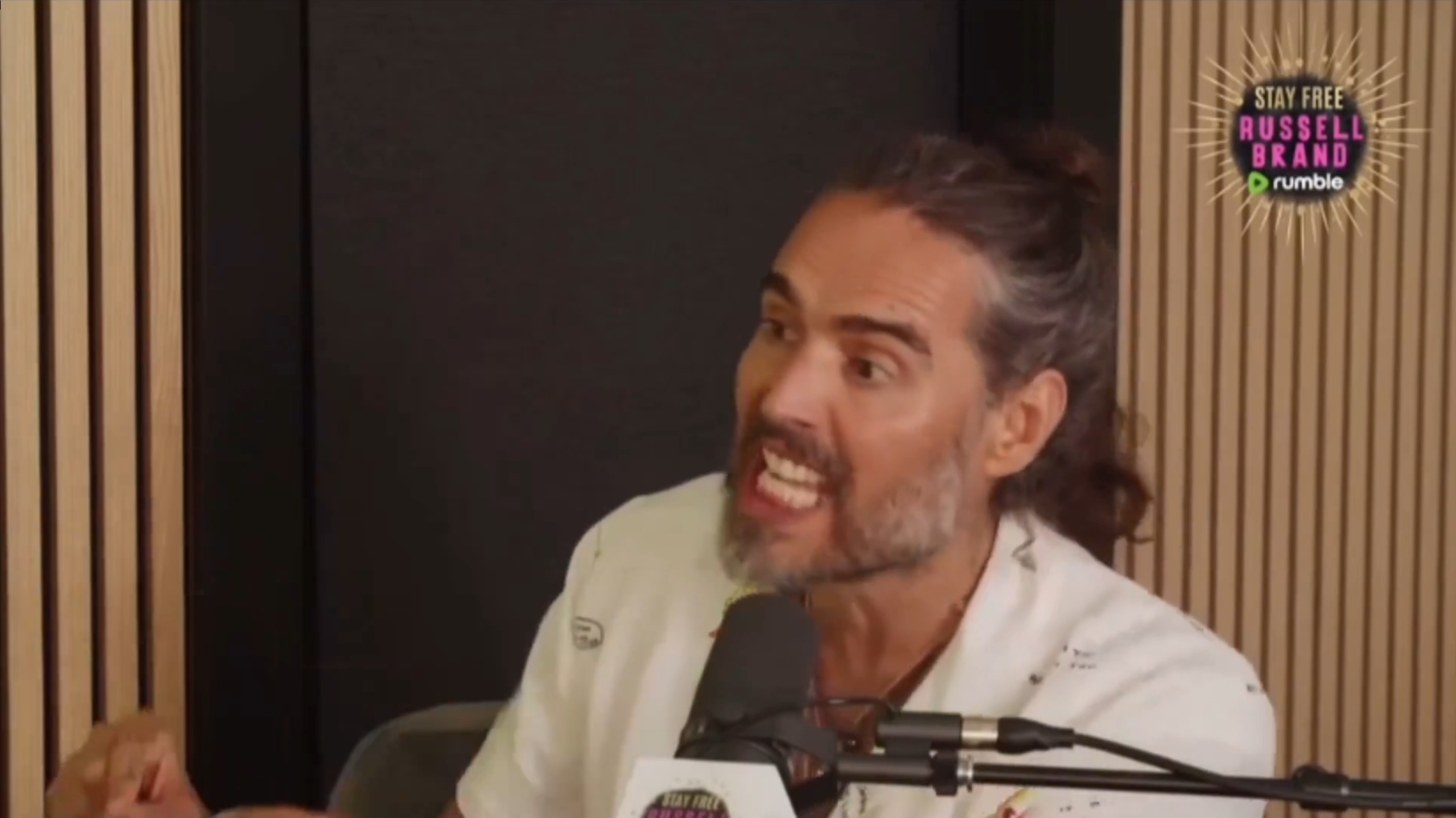 Russell Brand Says Trump Would Protect Democracy Over Biden