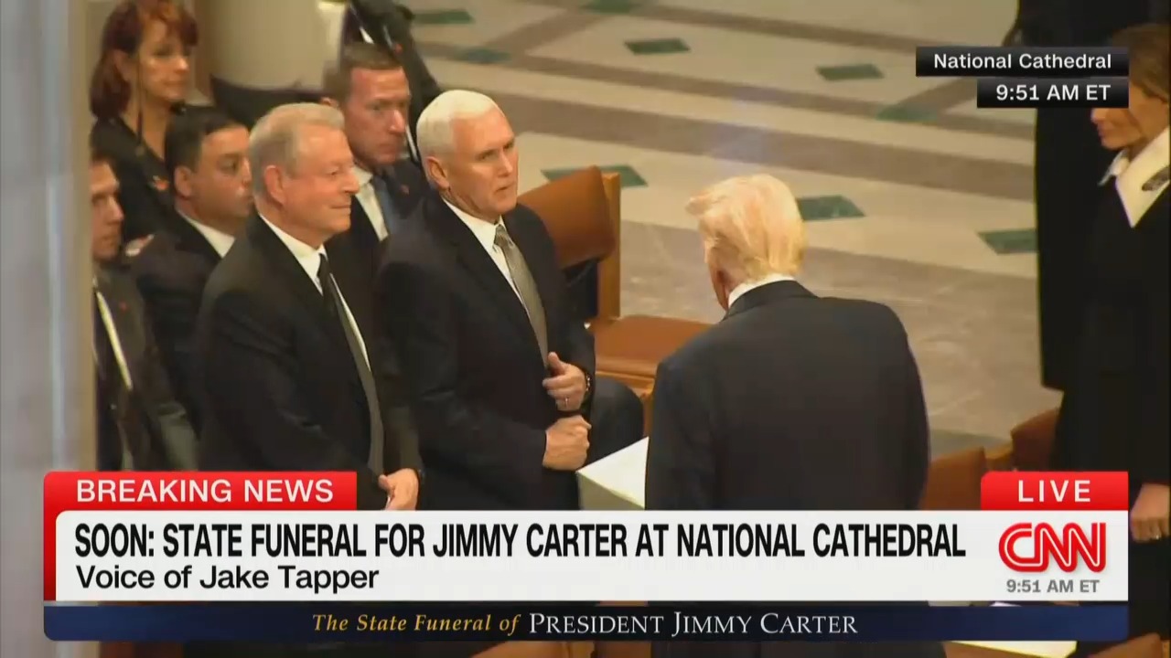 Donald Trump and Mike Pence Greet at Jimmy Carter's Funeral