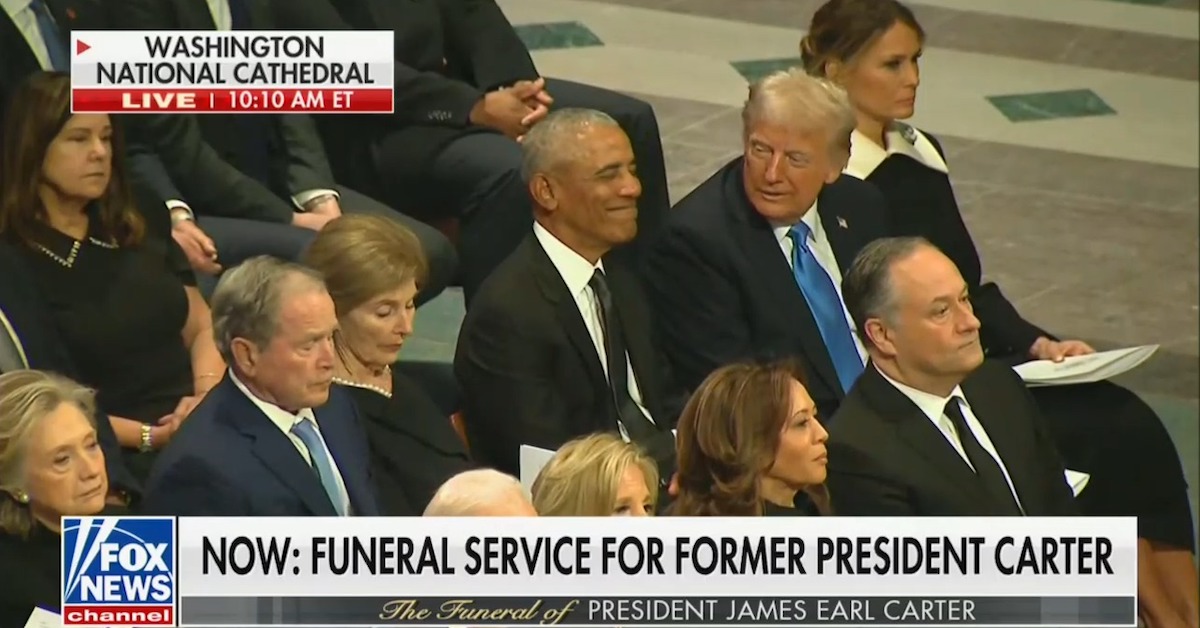 Trump and Obama Laugh, Chum It Up At Jimmy Carter Funeral